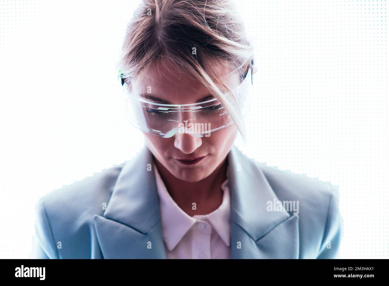 business woman with cyborg bionic arm and augmented reality visor ...