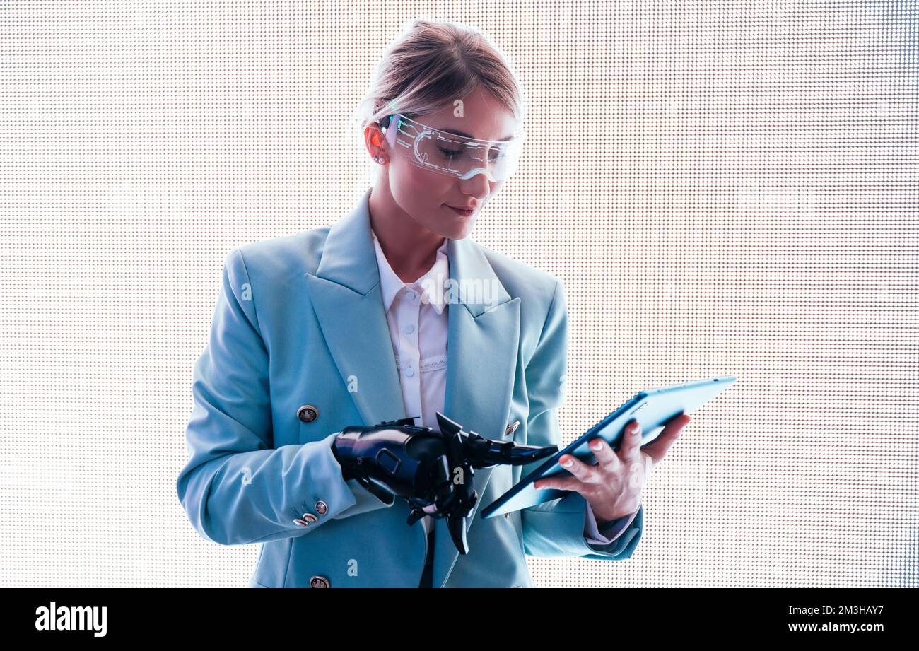 business woman with cyborg bionic arm and augmented reality visor. Representation of the future ...