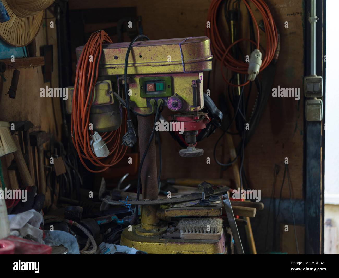 a view of an old garage with machine Stock Photo - Alamy