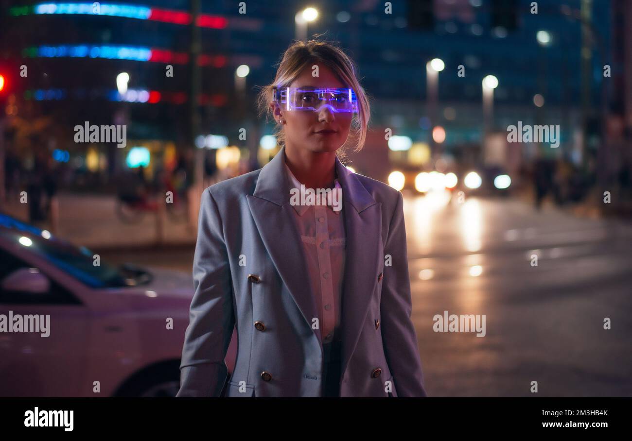 business woman with cyborg bionic arm and augmented reality visor Stock ...