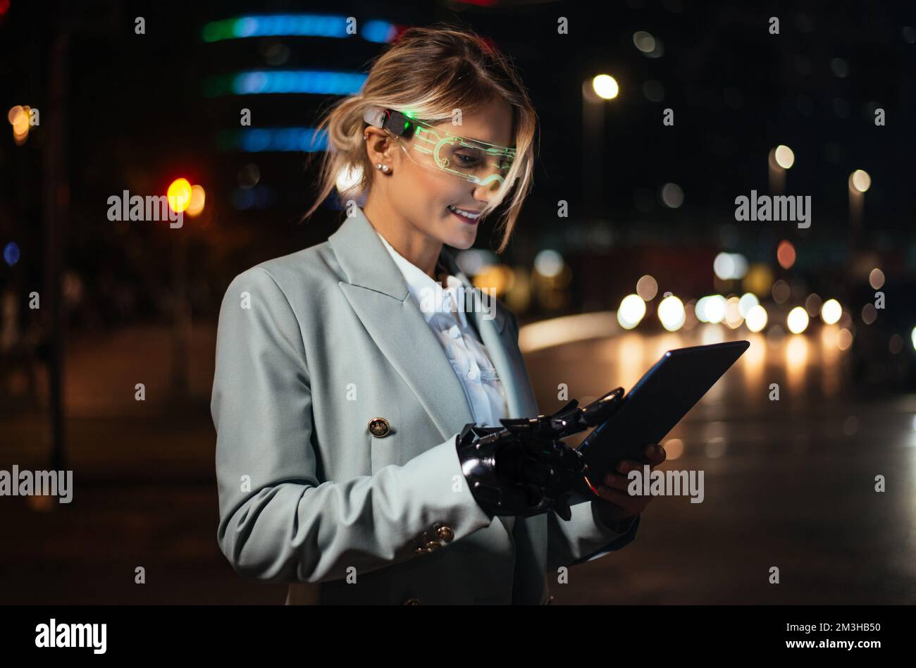 business woman with cyborg bionic arm and augmented reality visor Stock ...