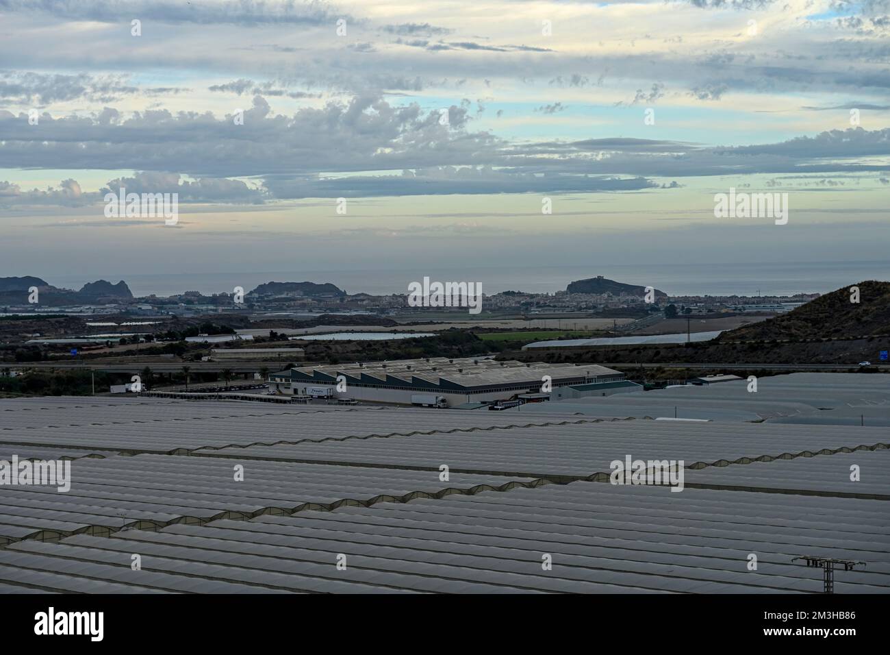 Aerial view of large fields of greenhouses, cultivation of vegetables ...