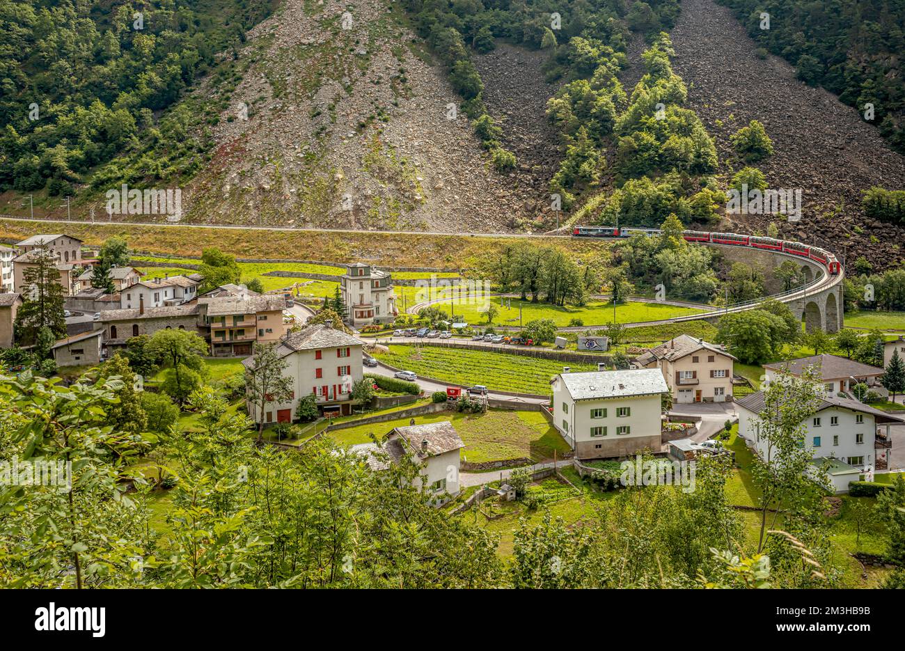 Bernina Express train at Brusio spiral viaduct, Valposchiavo ...