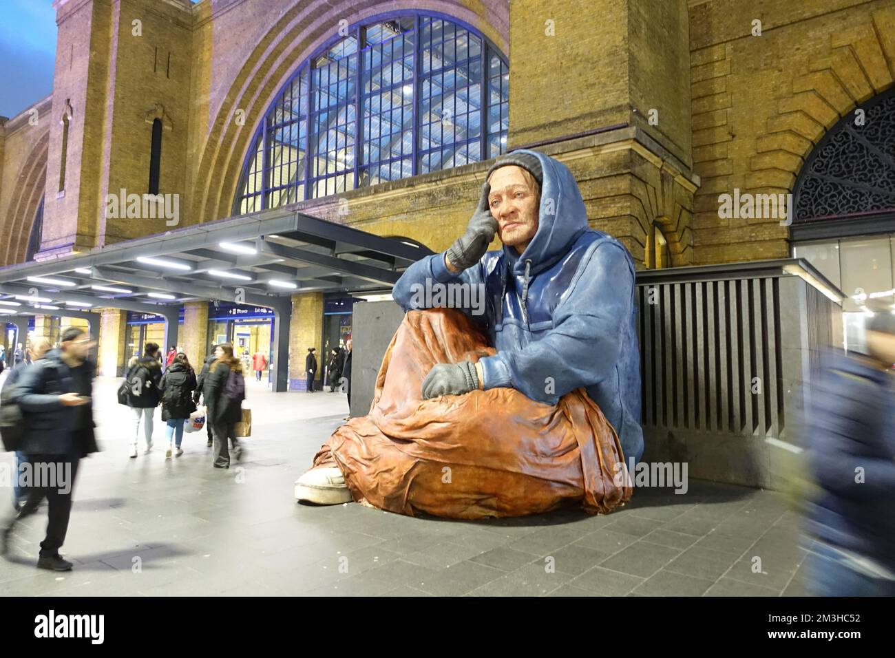 Composite artwork of a giant homeless person, King's cross station ...