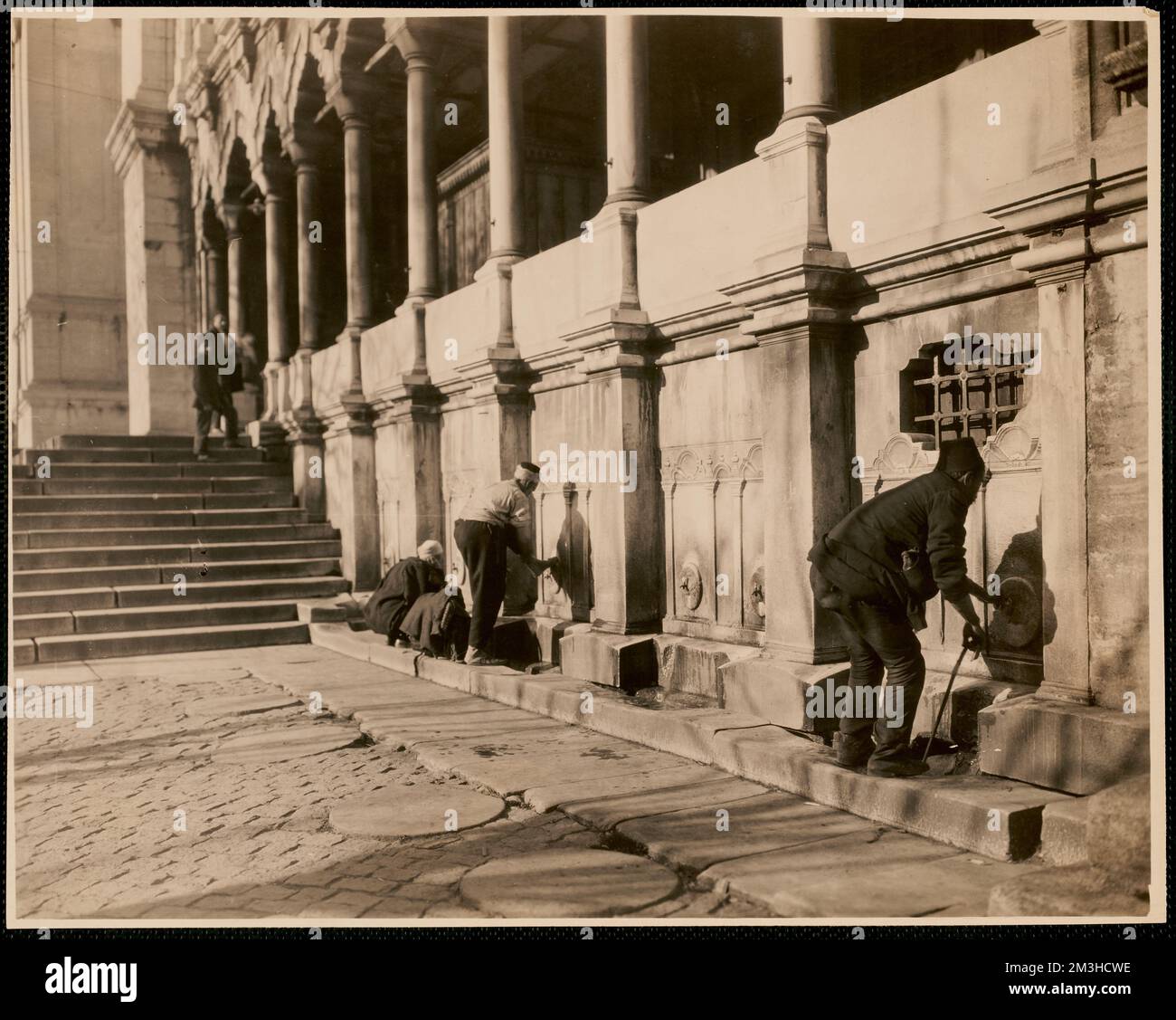 Moslems washing hands and feet before entering a mosque in Stamboul ...