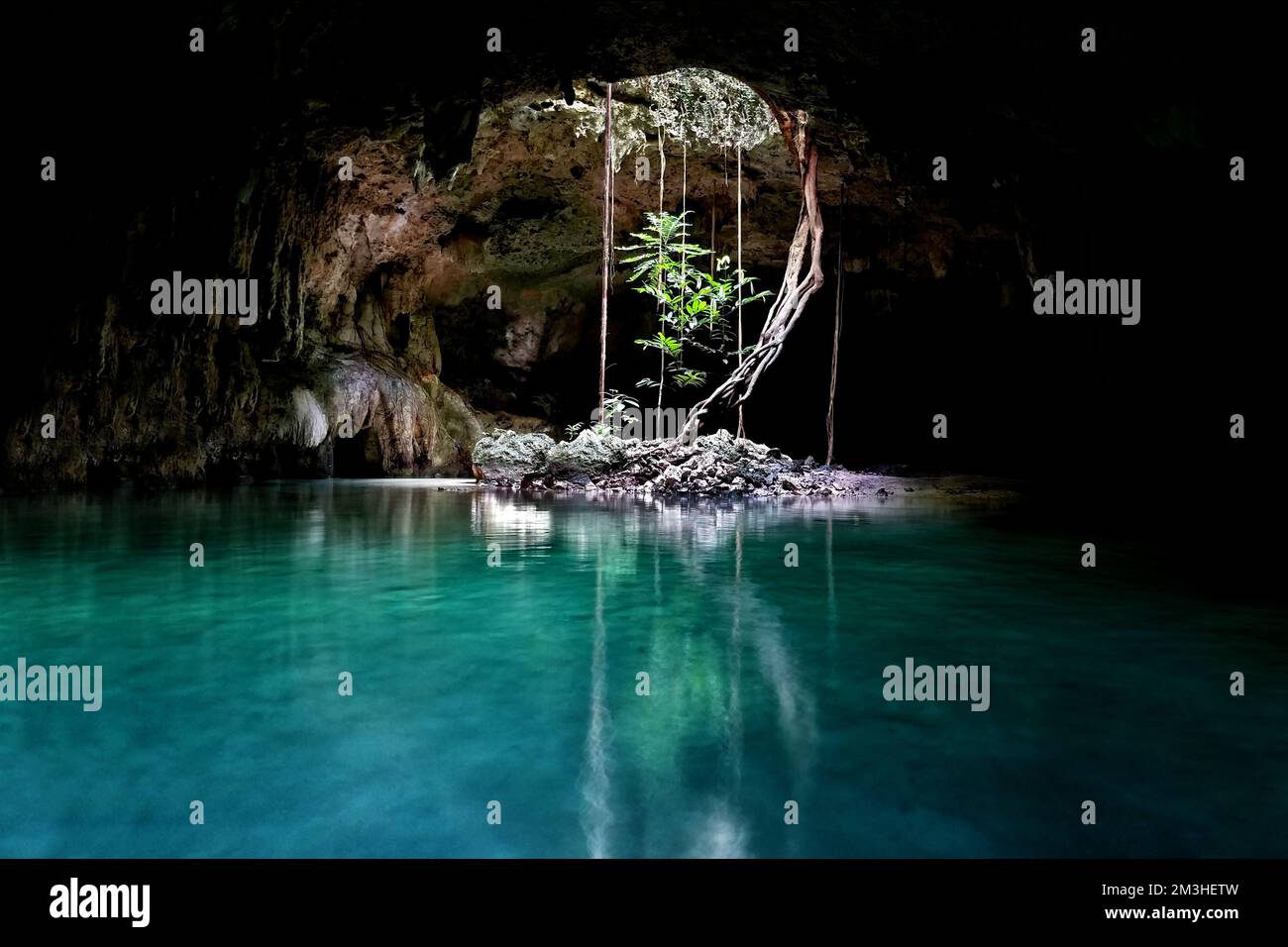 A beautiful shot of a cave of Two Eyes Cenote in Tulum Mexico Stock ...