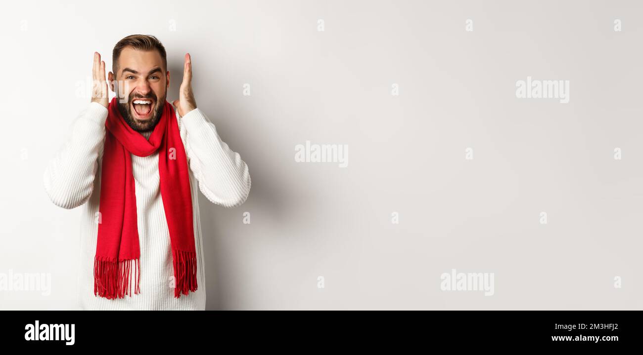 Christmas holidays and New Year concept. Angry man in scream and shout ...