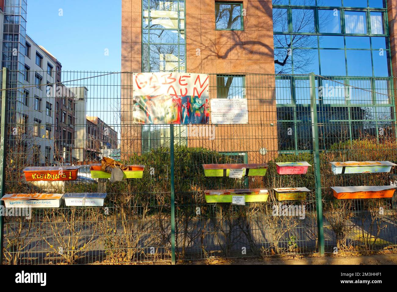 Gifts for poor homeless people, fence, Berlin Stock Photo - Alamy