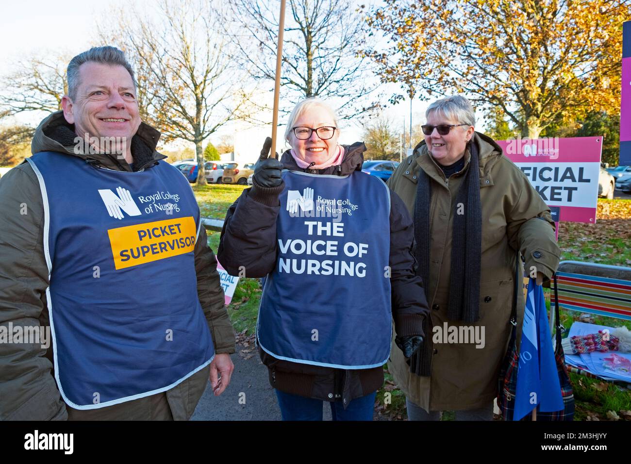 Nurses strike on picket line with protest placards stand in the cold ...