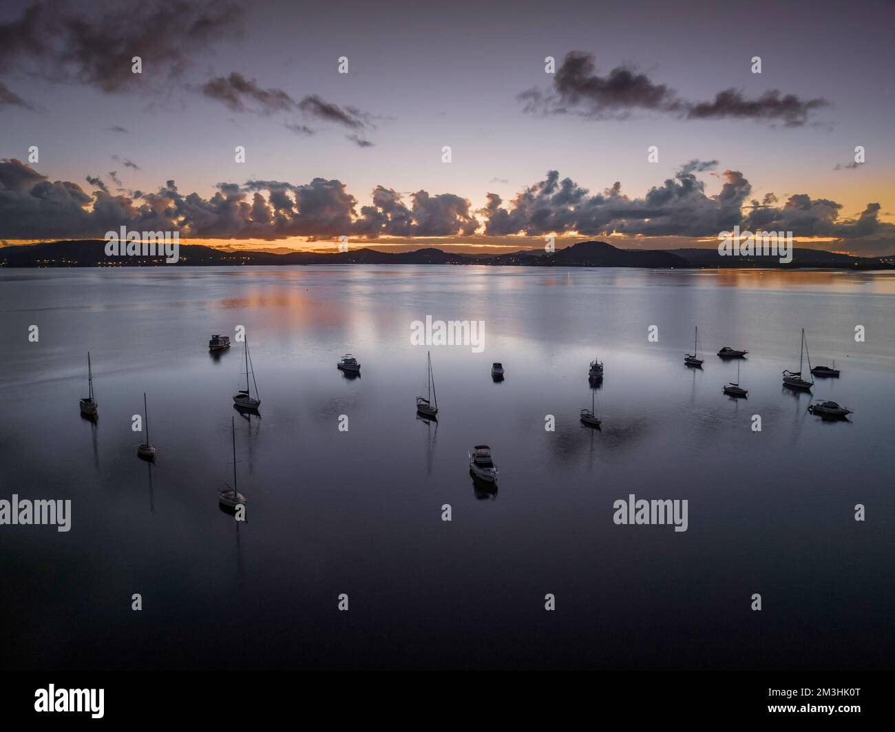 Sunrise, clouds and boat reflections on Brisbane Water at Koolewong and ...