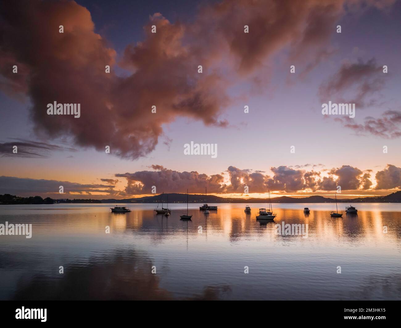 Sunrise, clouds and boat reflections on Brisbane Water at Koolewong and ...
