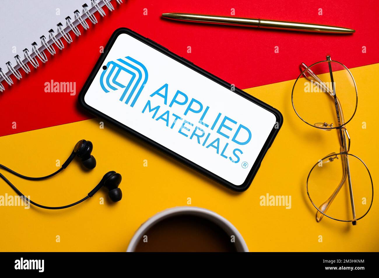 In this photo illustration an Applied Materials logo seen displayed on ...