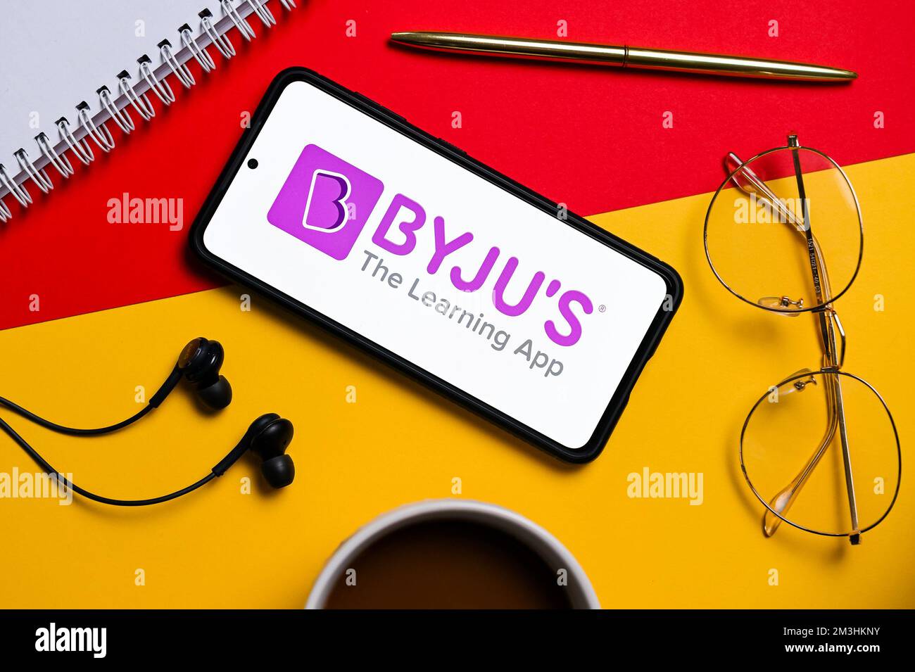 In this photo illustration a Byju's logo seen displayed on a smartphone ...