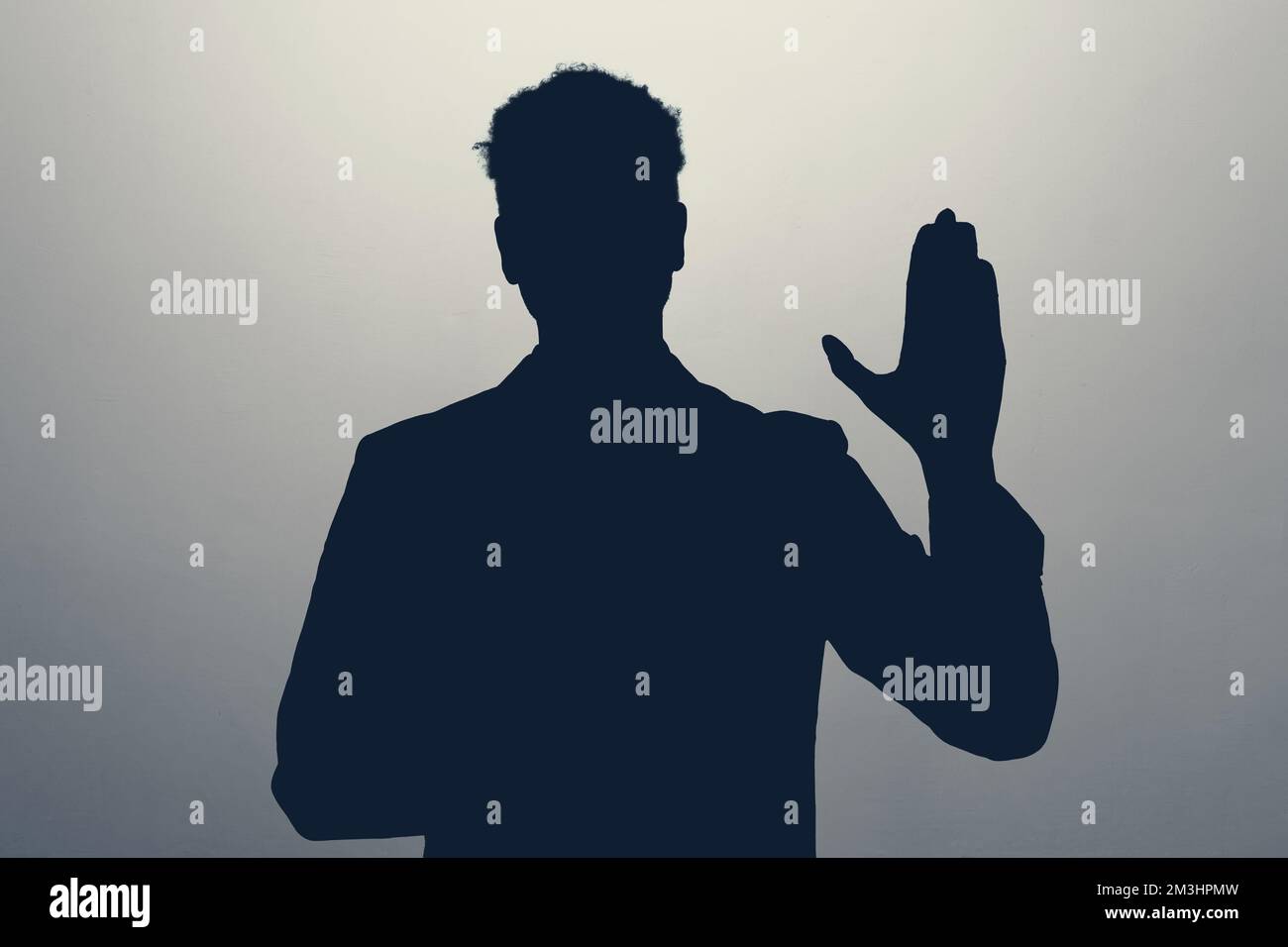 Unknown male silhouette making a promise or oath. I will tell only the ...