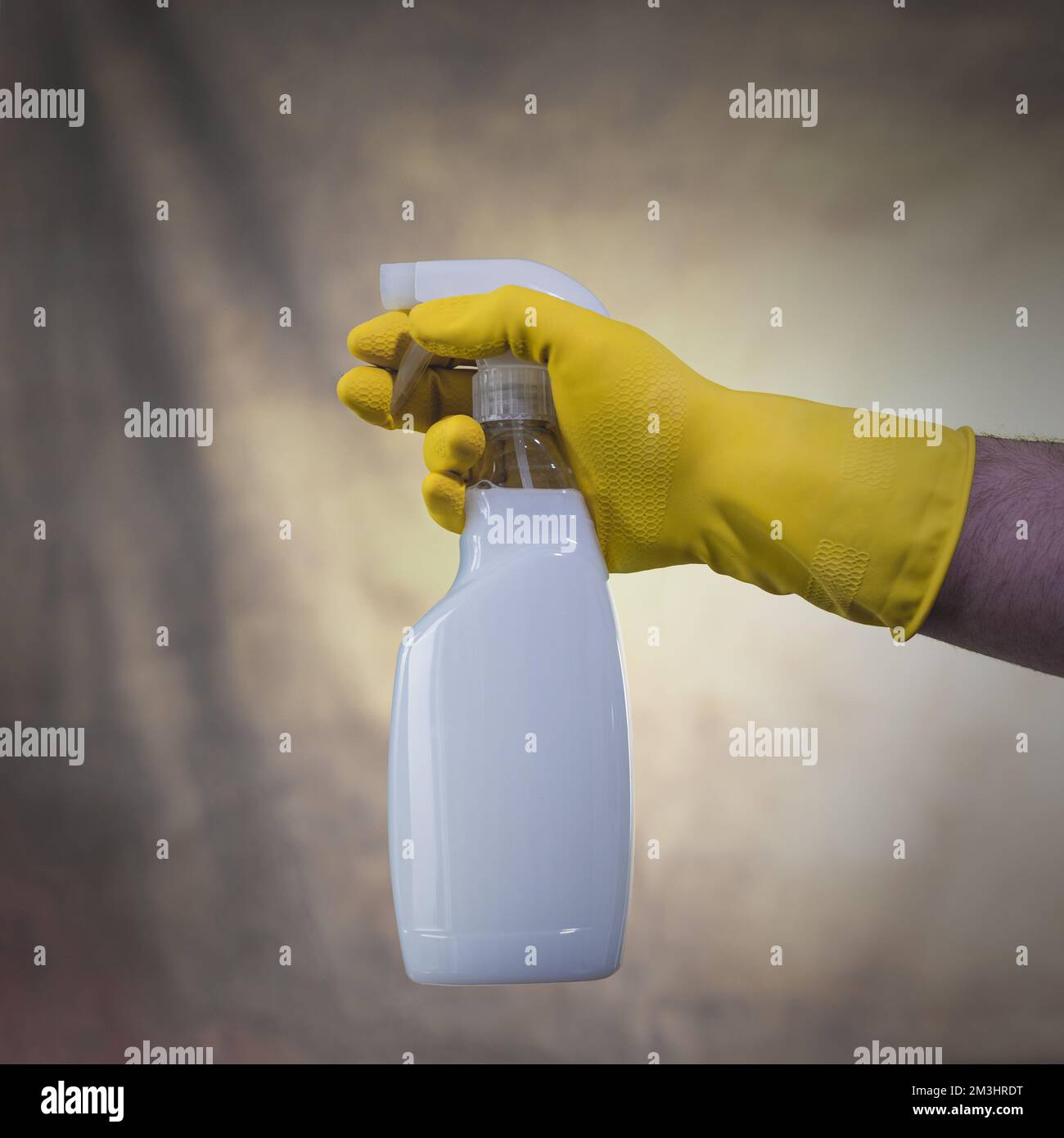 Cleaning dirty surfaces with a cleaning agent. Hand in a rubber glove ...