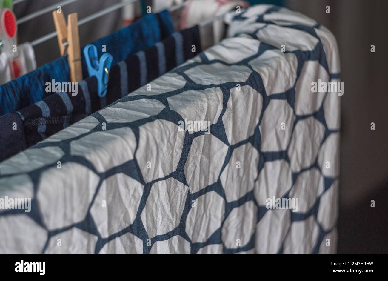 laundry dries on the rack. wet laundry texture Stock Photo - Alamy