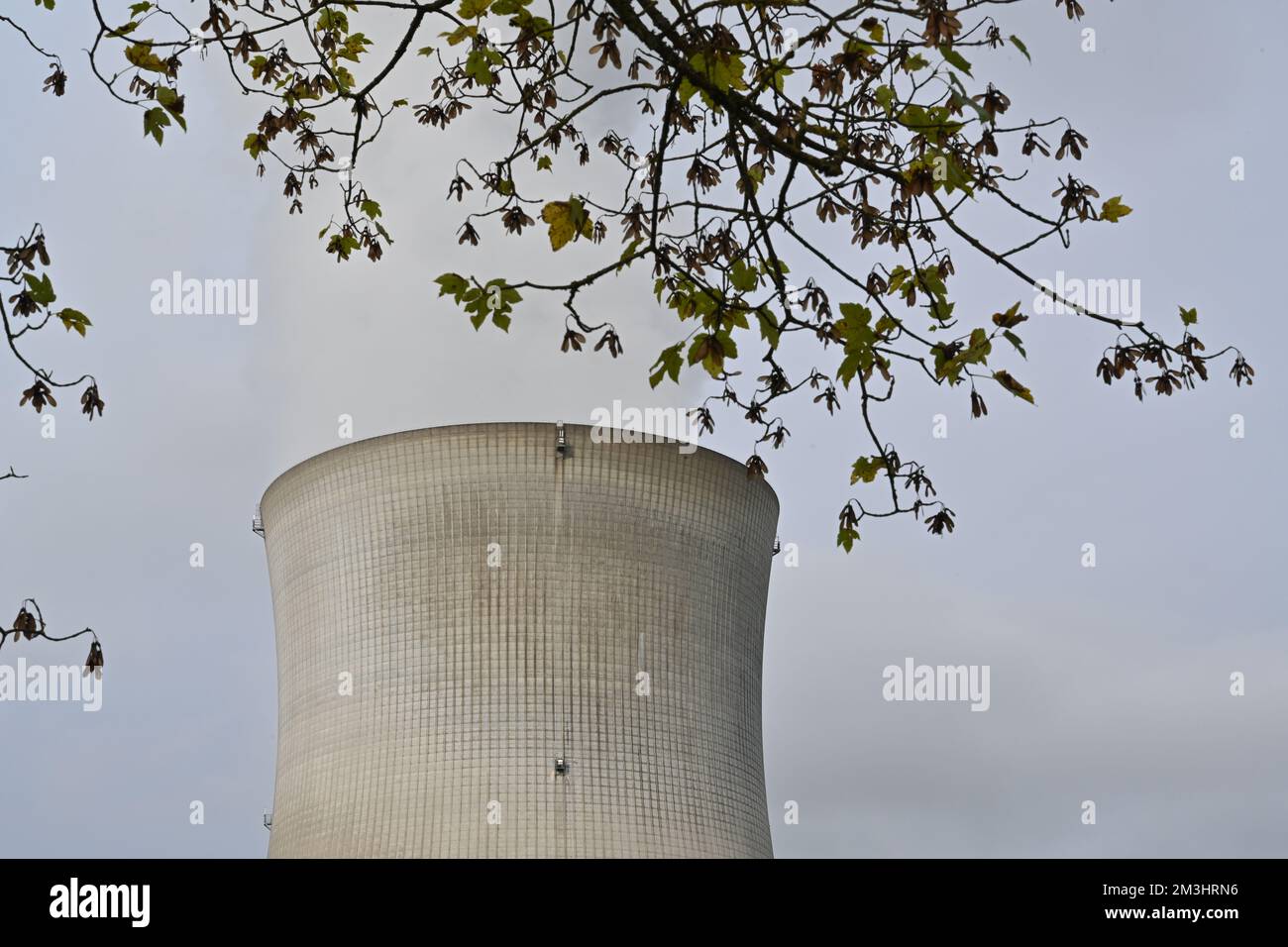 Top of cooling tower of nuclear power plant with vapor rising out of it ...