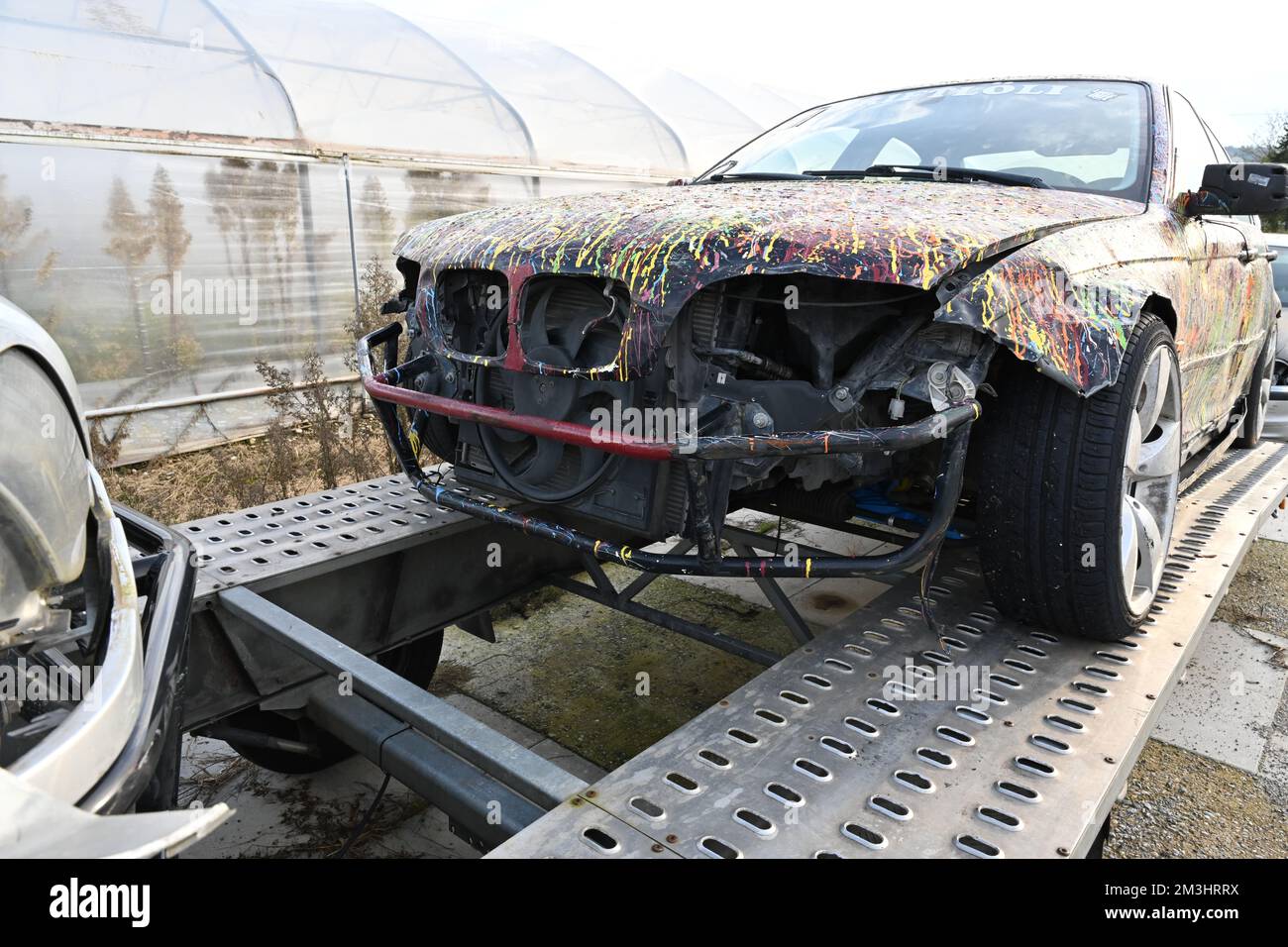 Close up view on drift crashed car, secured on aluminium trailer Stock ...