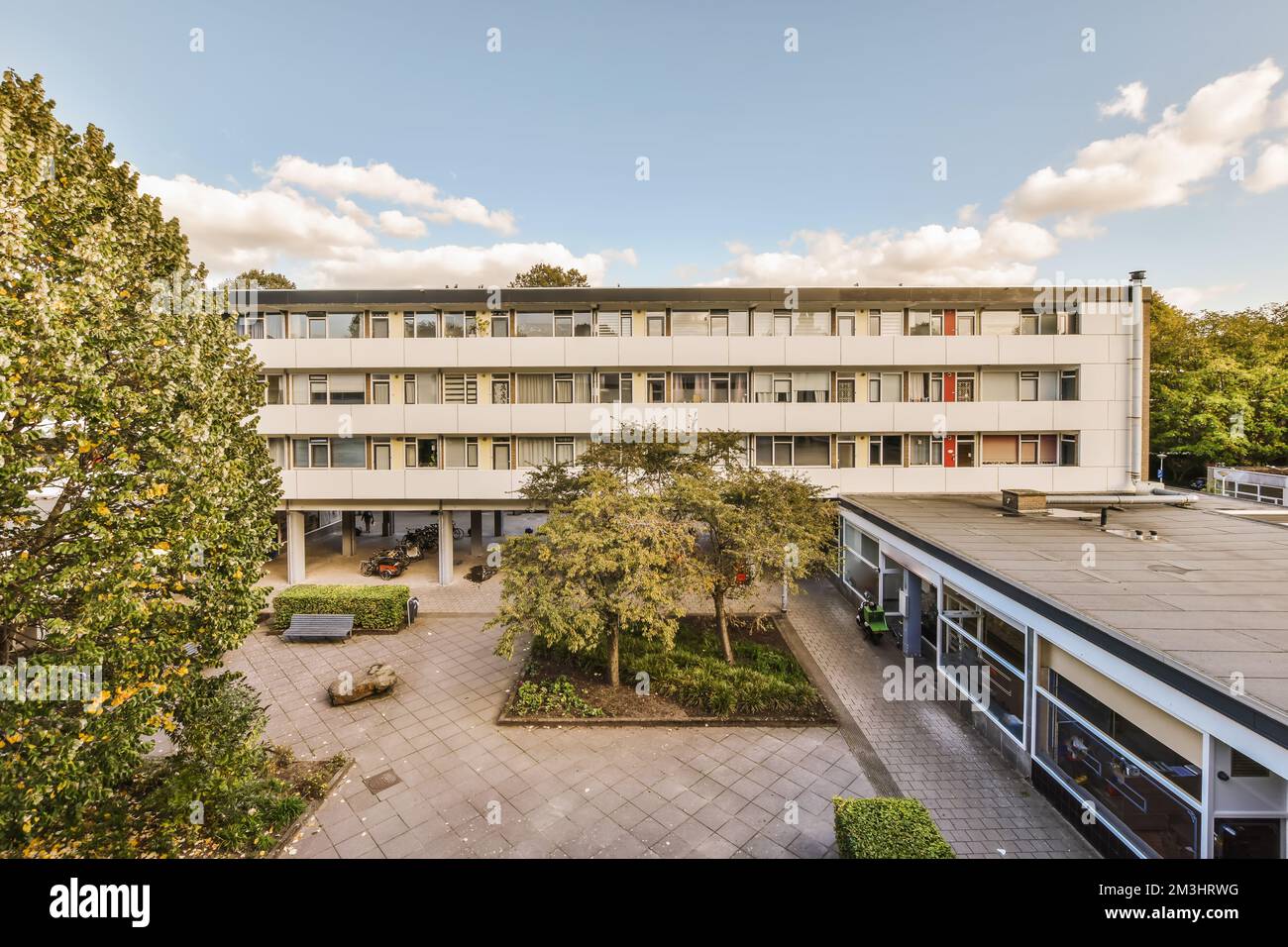 an outside area with buildings and trees in the fore - image was taken ...