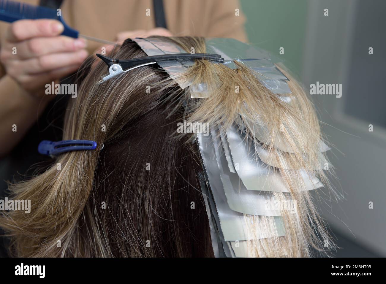 A styling and position of the hair during the dyeing process. with ...