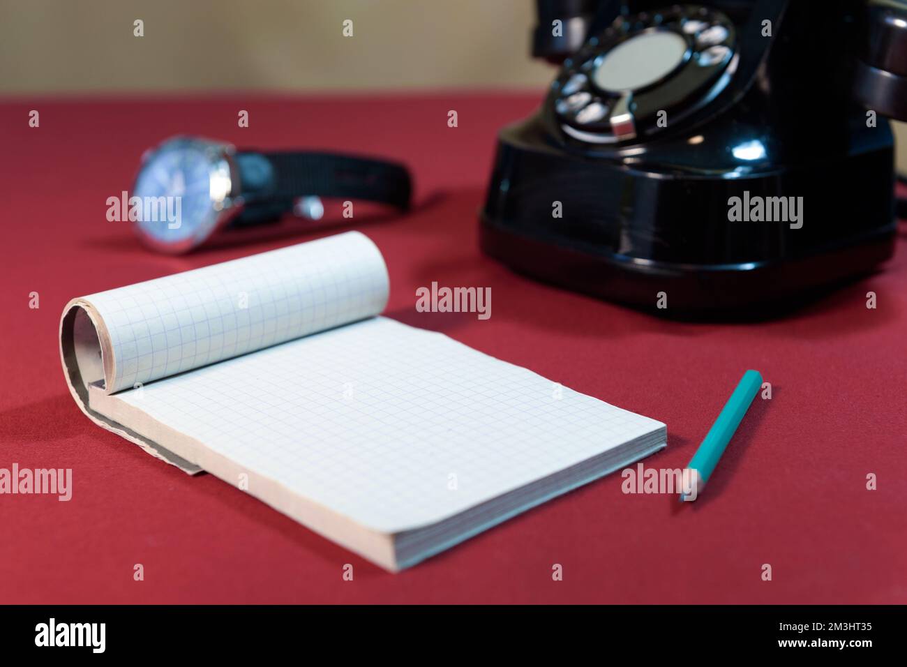 Blank sheet of paper in a notepad. Old fashioned scene. An ink pen, an ...