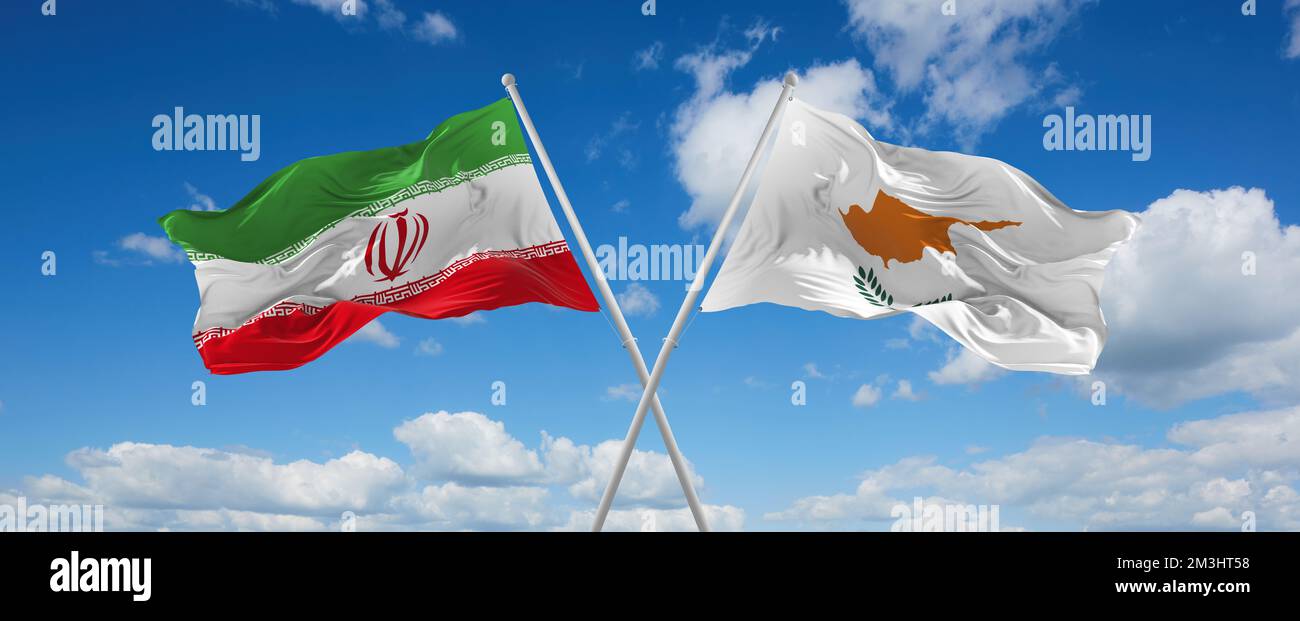 two crossed flags Cyprus and Iran waving in wind at cloudy sky. Concept ...