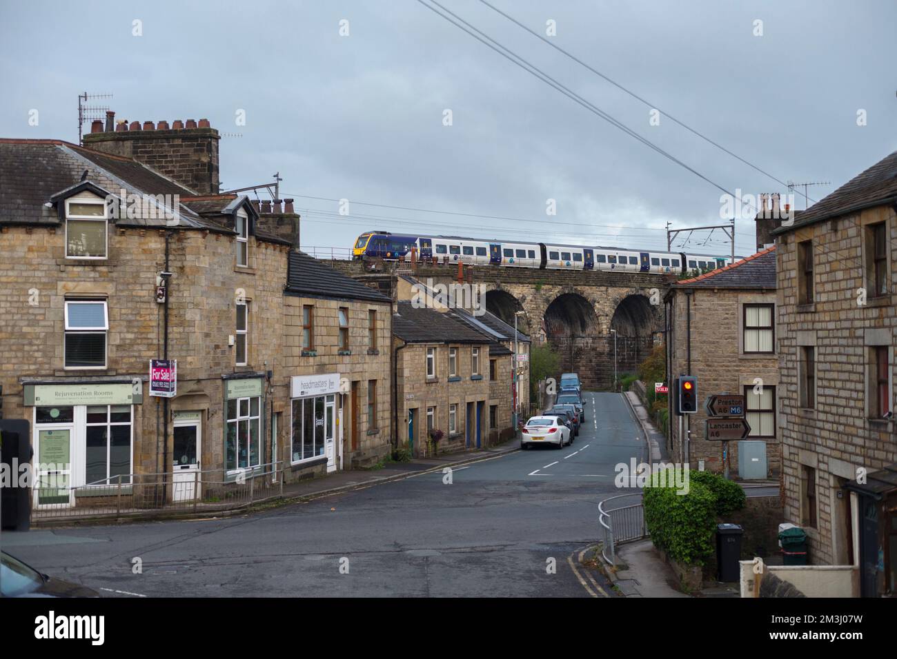 Northern Rail CAF class 195 train crossing the Conder viaduct at ...