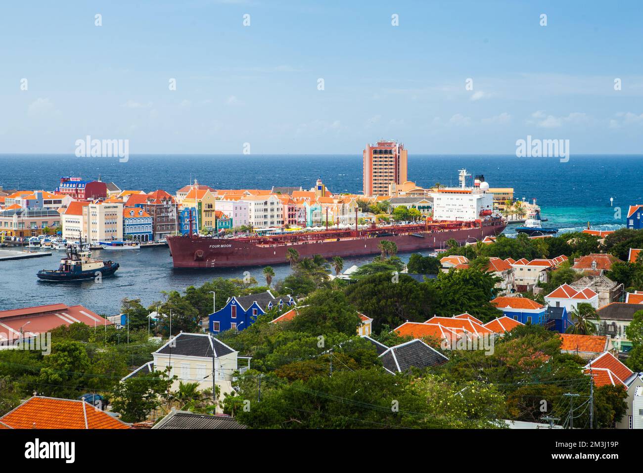 A Containership entering the St Anna bay harbor in Curacao Stock Photo ...