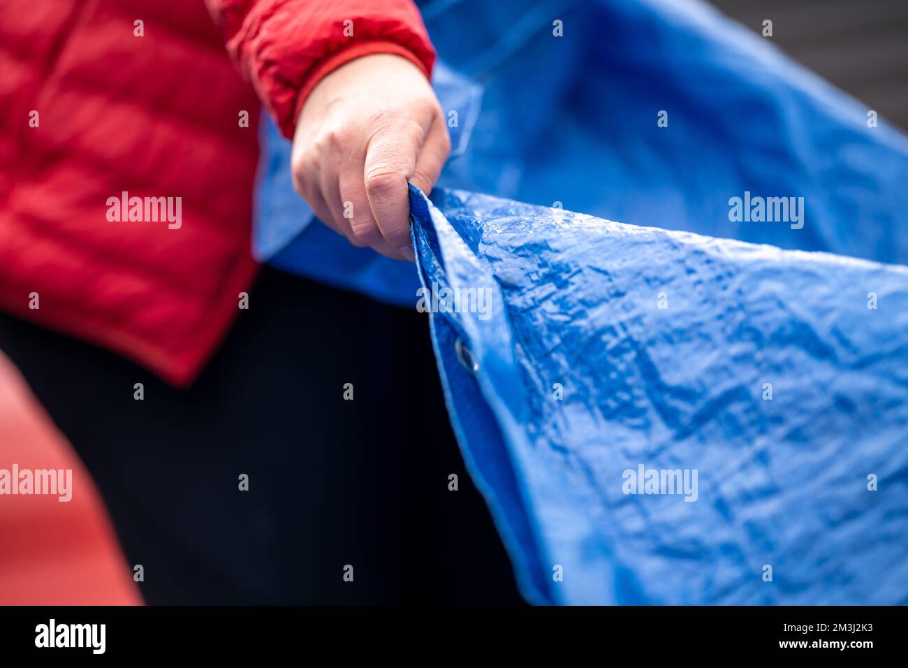 Woman sleeping under a tree hi-res stock photography and images - Alamy