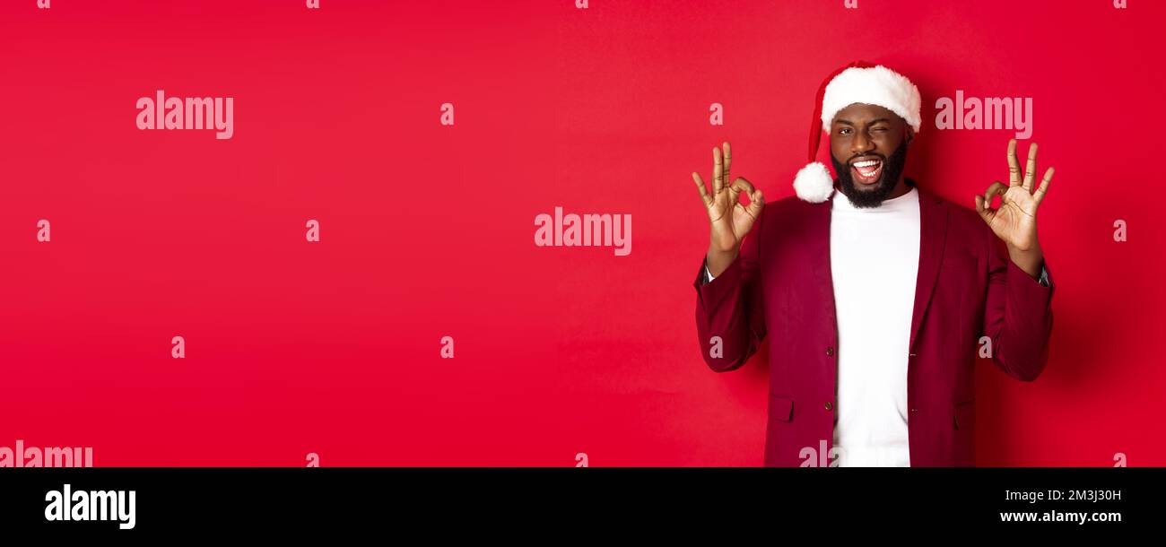 Christmas, party and holidays concept. Handsome african american man in ...