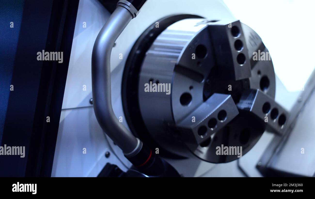 Close up of rotating fast metal detail. Motion. Spinning part of an ...