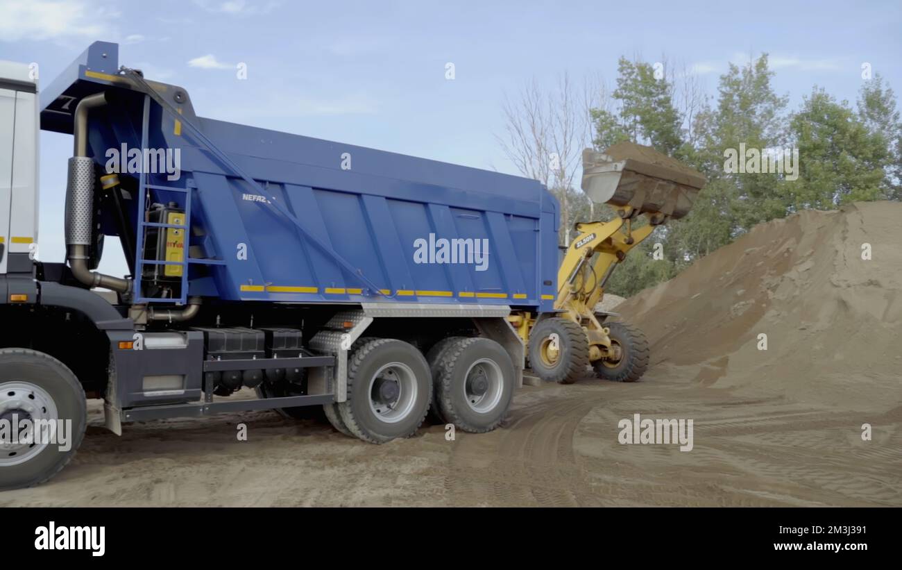 Berlin, Germany - June 20, 2022: Different machines work at a stone ...