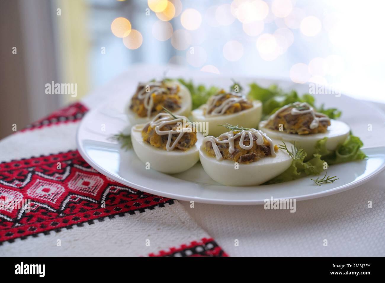 Deviled eggs aka stuffed eggs. Traditional Ukrainian food on the table ...