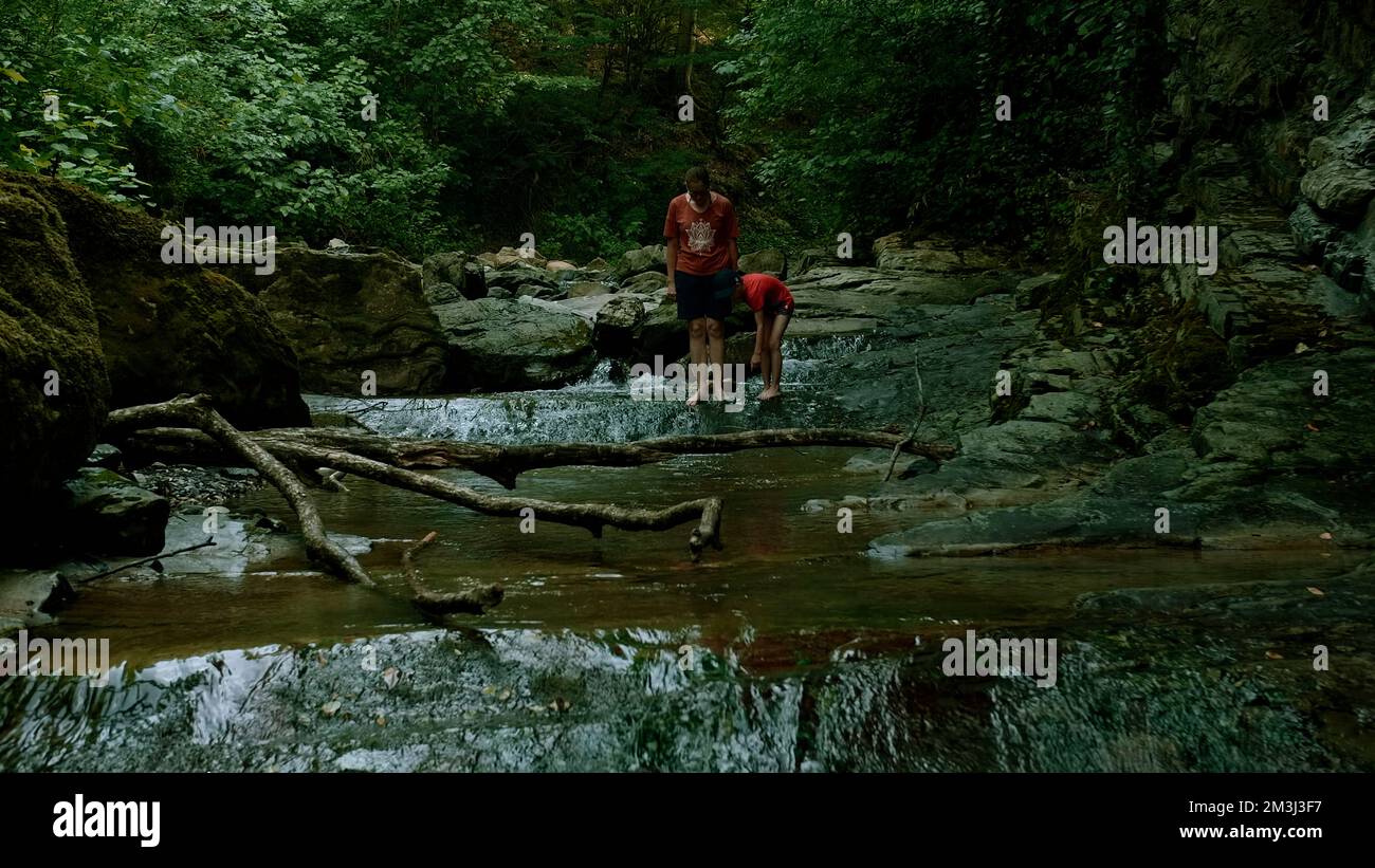 Hiker washing face in cold hi-res stock photography and images - Alamy