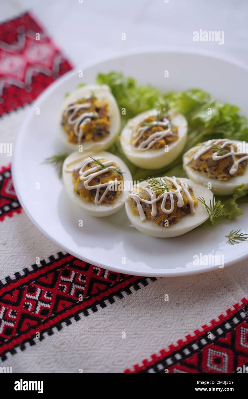 Deviled eggs aka stuffed eggs. Traditional Ukrainian food on the table ...