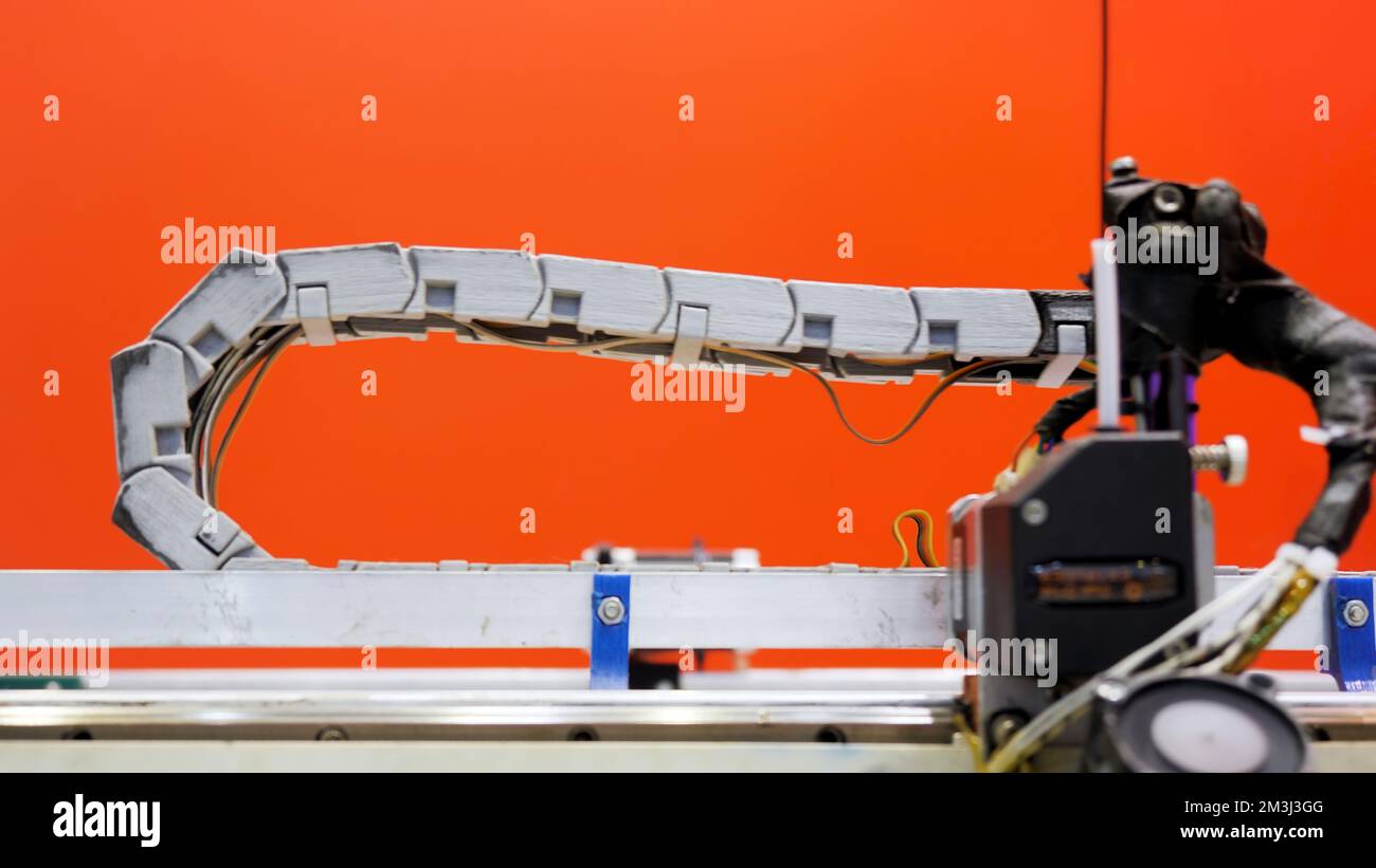 An iron robot working in a factory. Media.Development of equipment that ...