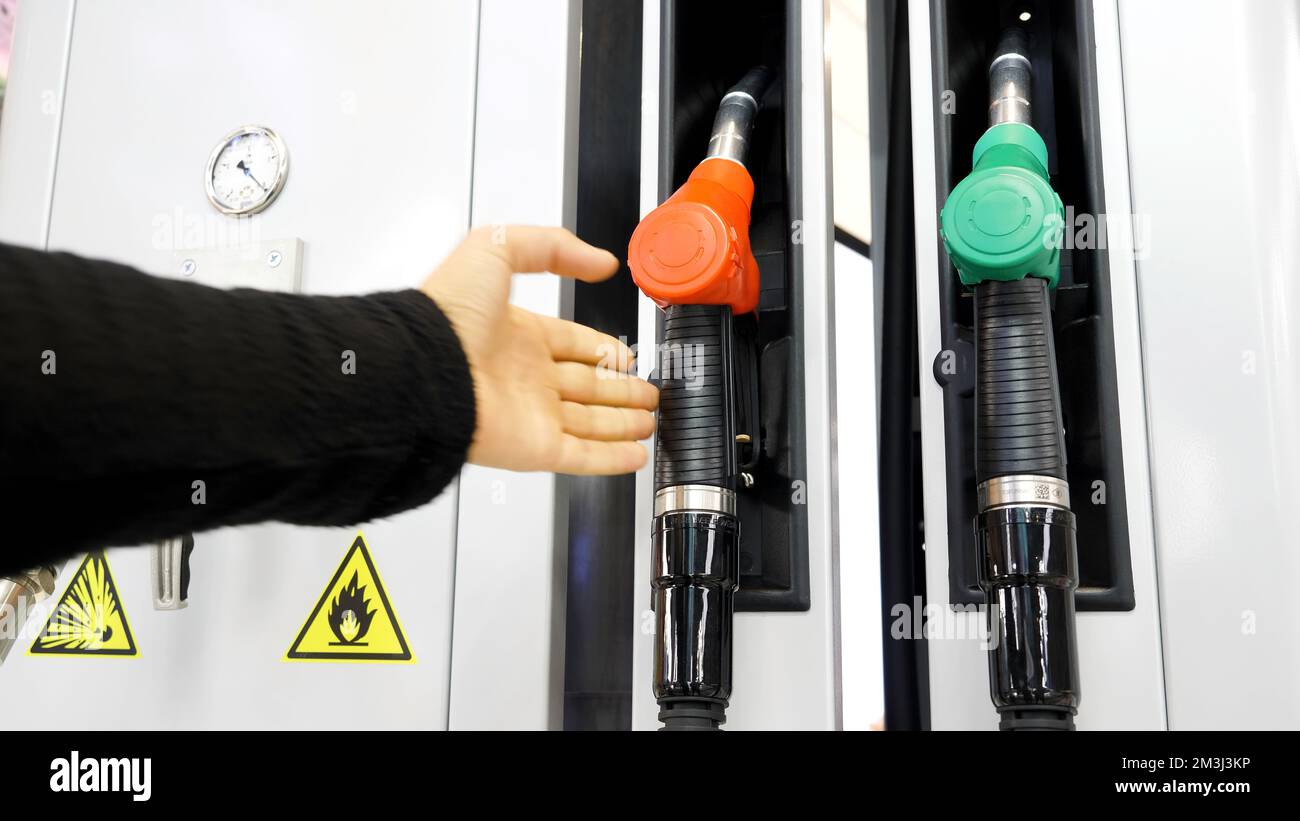 Gas station. Media.Cylinders with gasoline and gas are taken and then ...