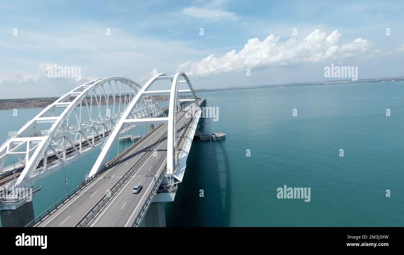 Top view of beautiful suspension bridge in sea. Shot. White bridge in ...