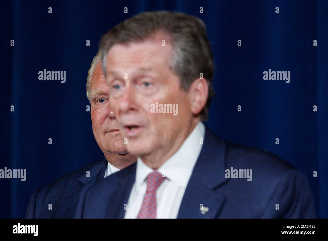 Ontario Premier Doug Ford, listens to Toronto Mayor John Tory during a ...