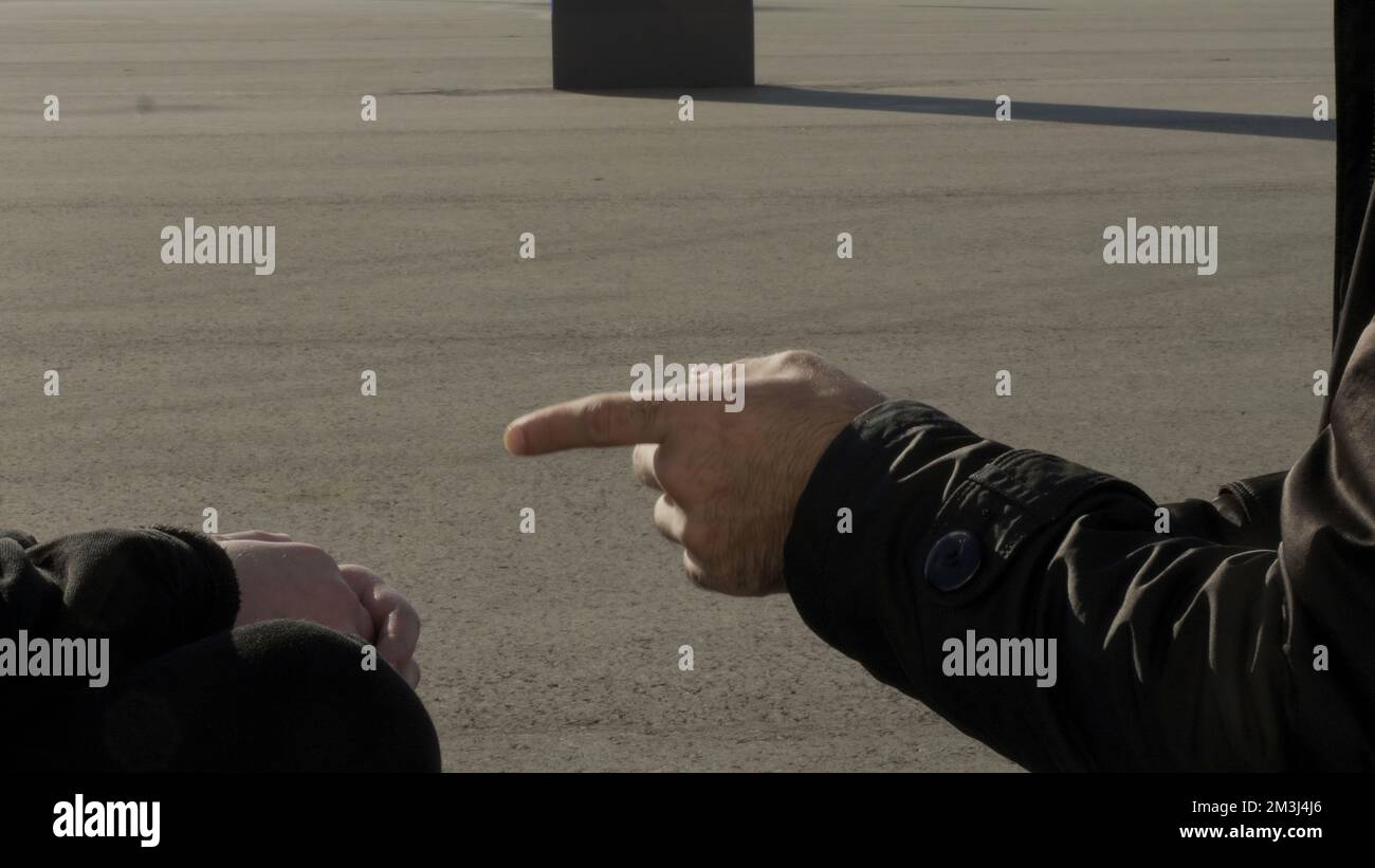 Sign language. HDR.A strong male hand that shows something to his ...