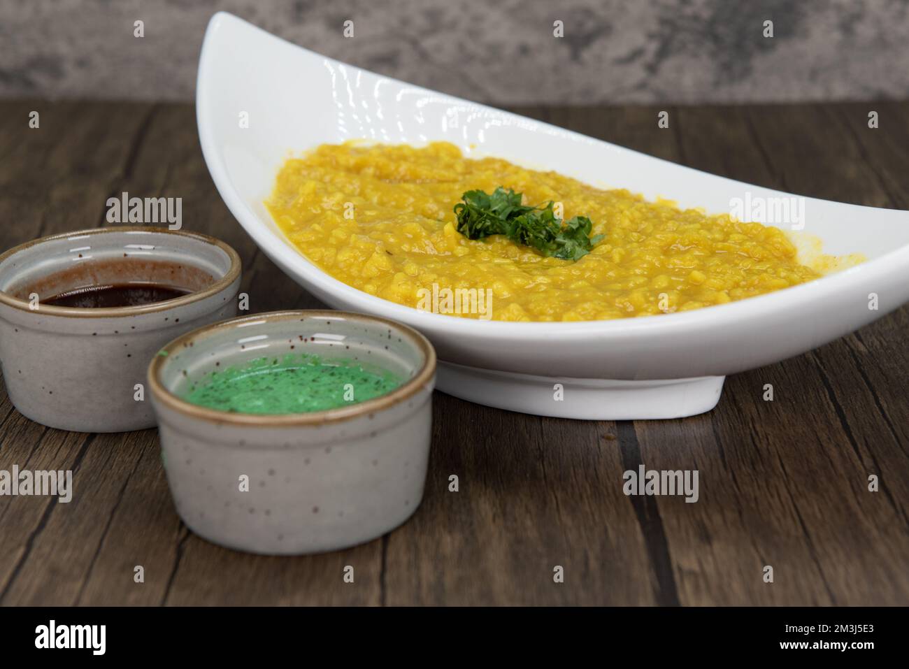 Traditional Indian meal starts with a delicious bowl of yellow daal ...