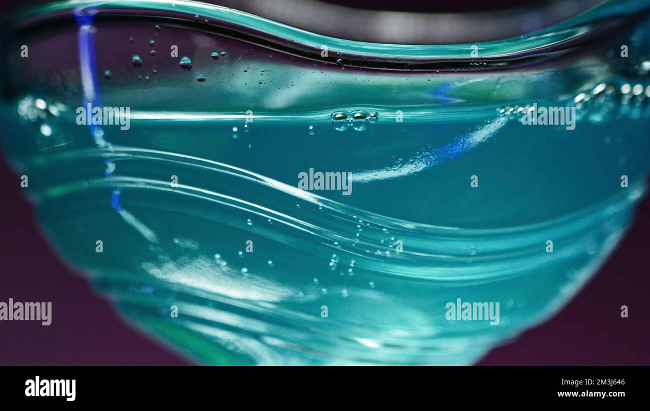 Juicy ripe lychee berries and the blue lagoon cocktail inside a glass ...