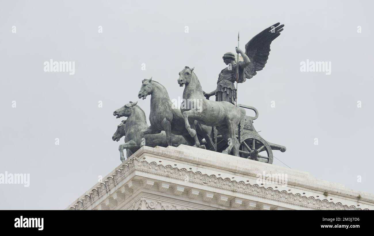 Italy, Rome - July 29, 2022: Statue with horses and man on building ...
