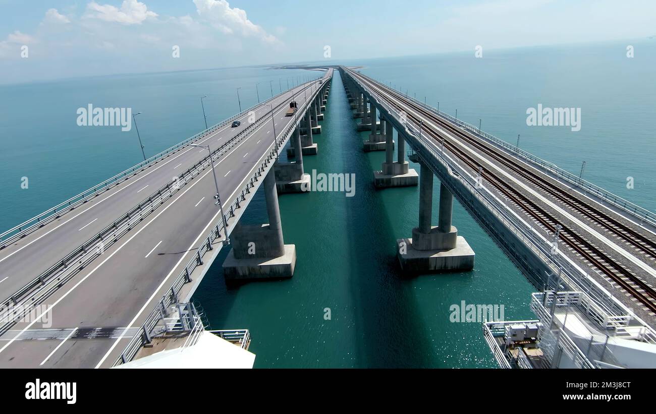Huge white bridges over the ocean. Shot.Paved roads connecting the ...