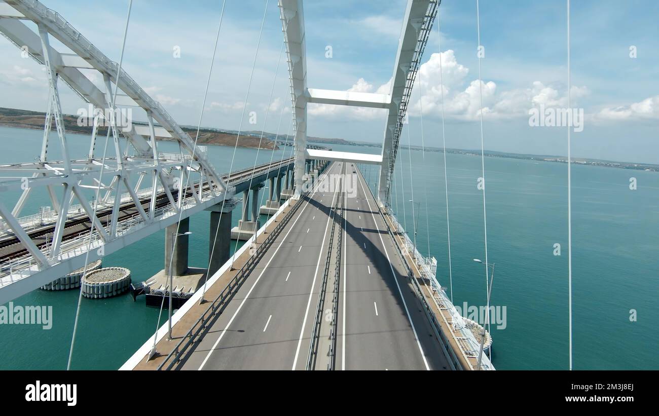Huge white bridges over the ocean. Shot.Paved roads connecting the ...