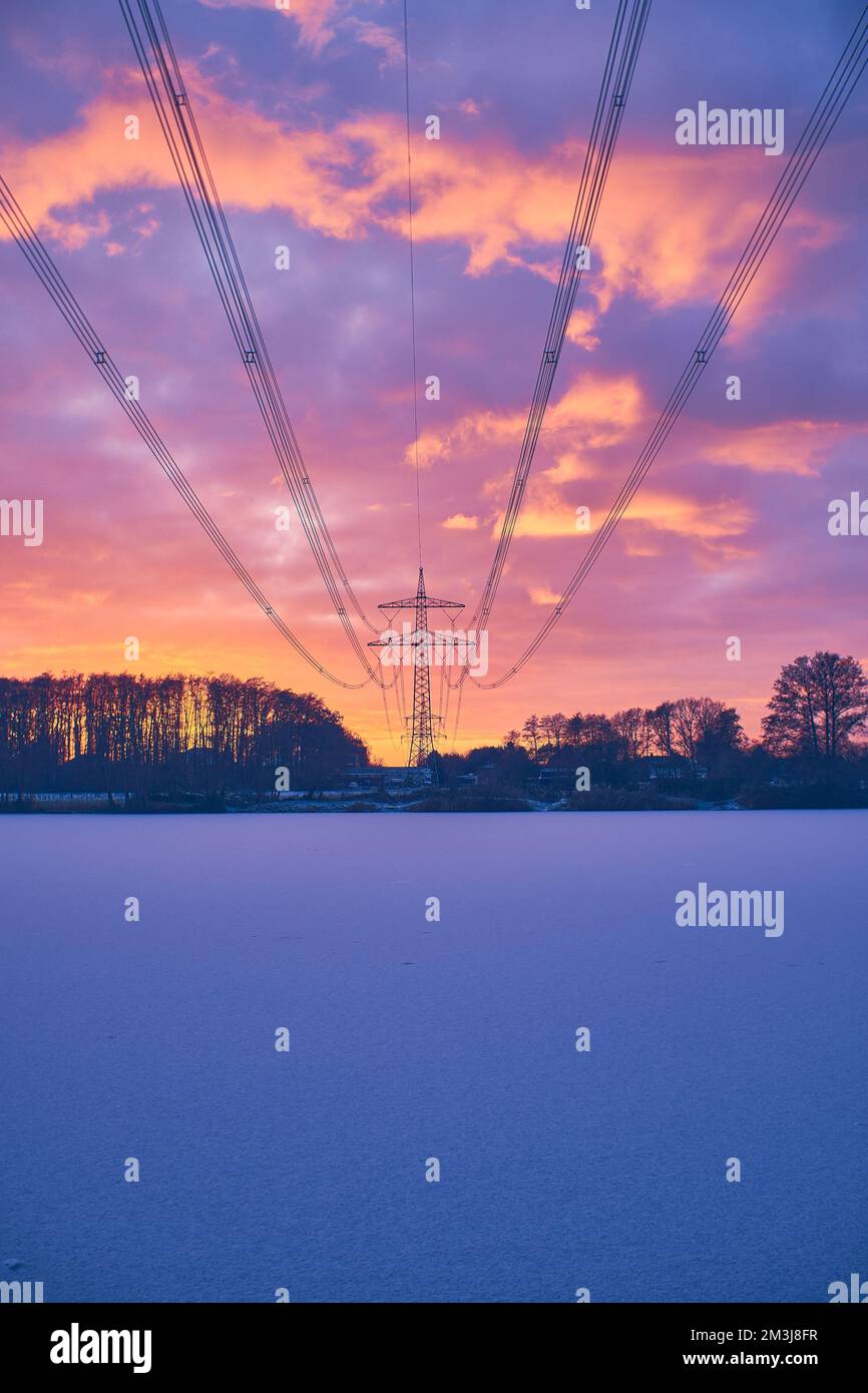 Power line over frozen lake. High quality photo Stock Photo - Alamy