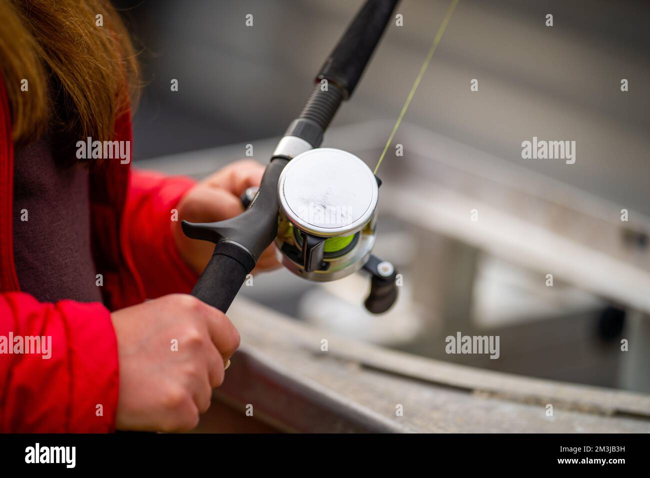 model girl fishing in a boat in summer in australia Stock Photo - Alamy