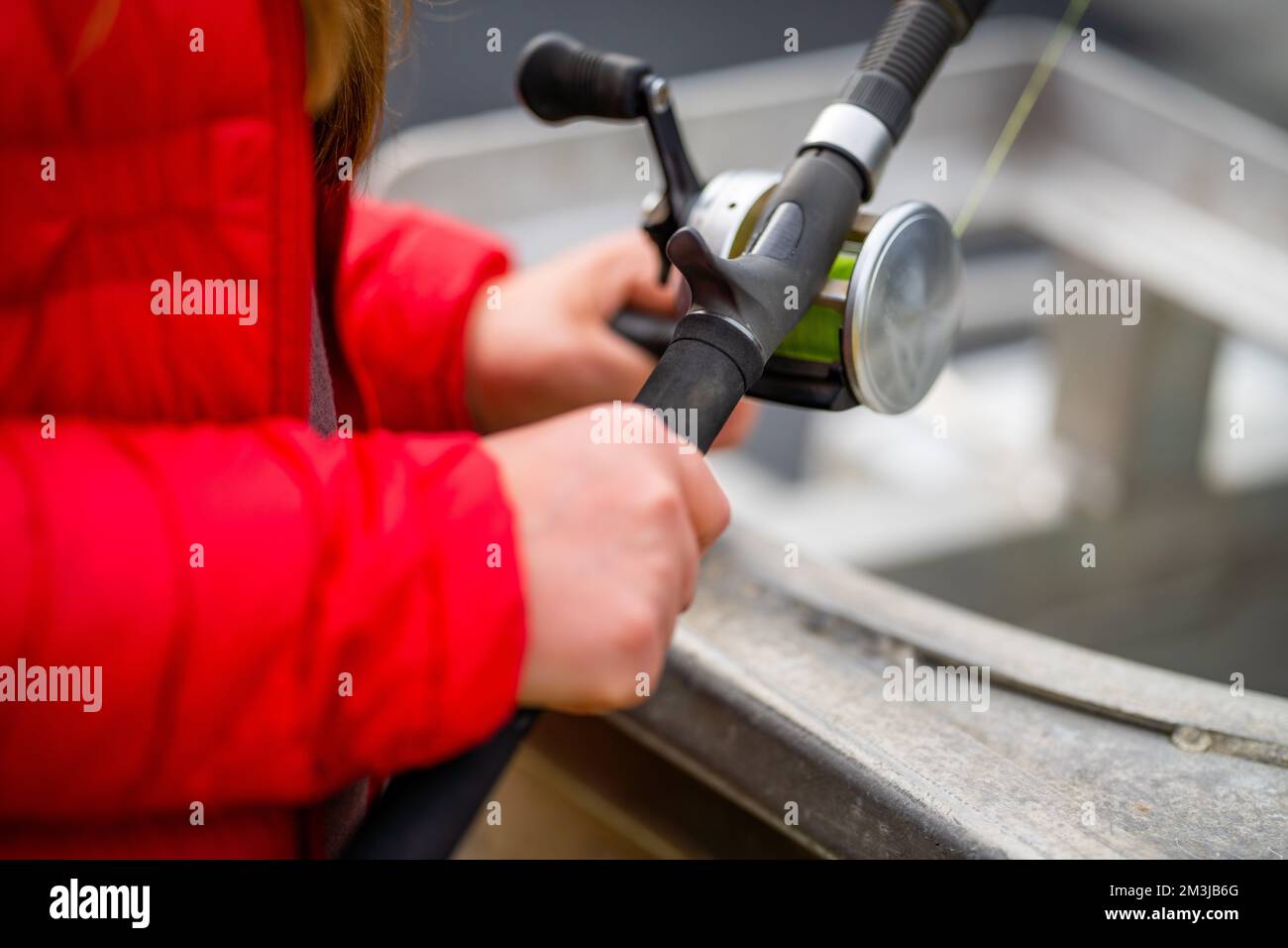 model girl fishing in a boat in summer in australia Stock Photo - Alamy