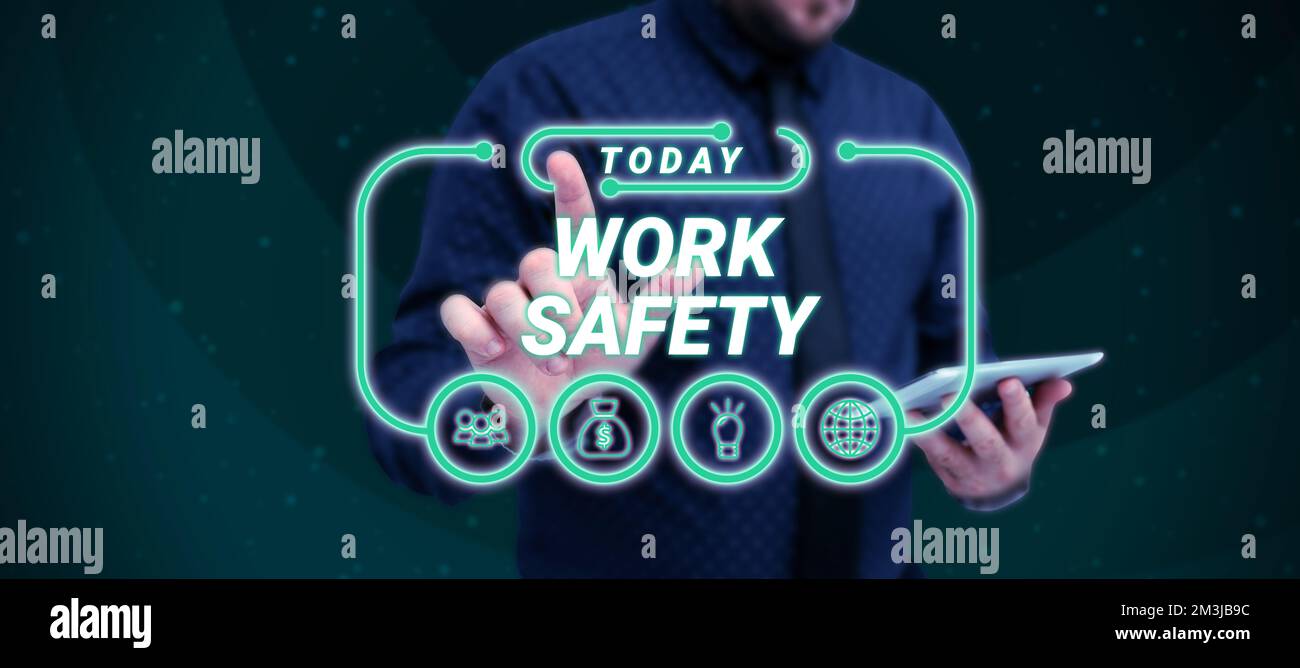 Sign displaying Work Safety. Business overview Policies and control in ...