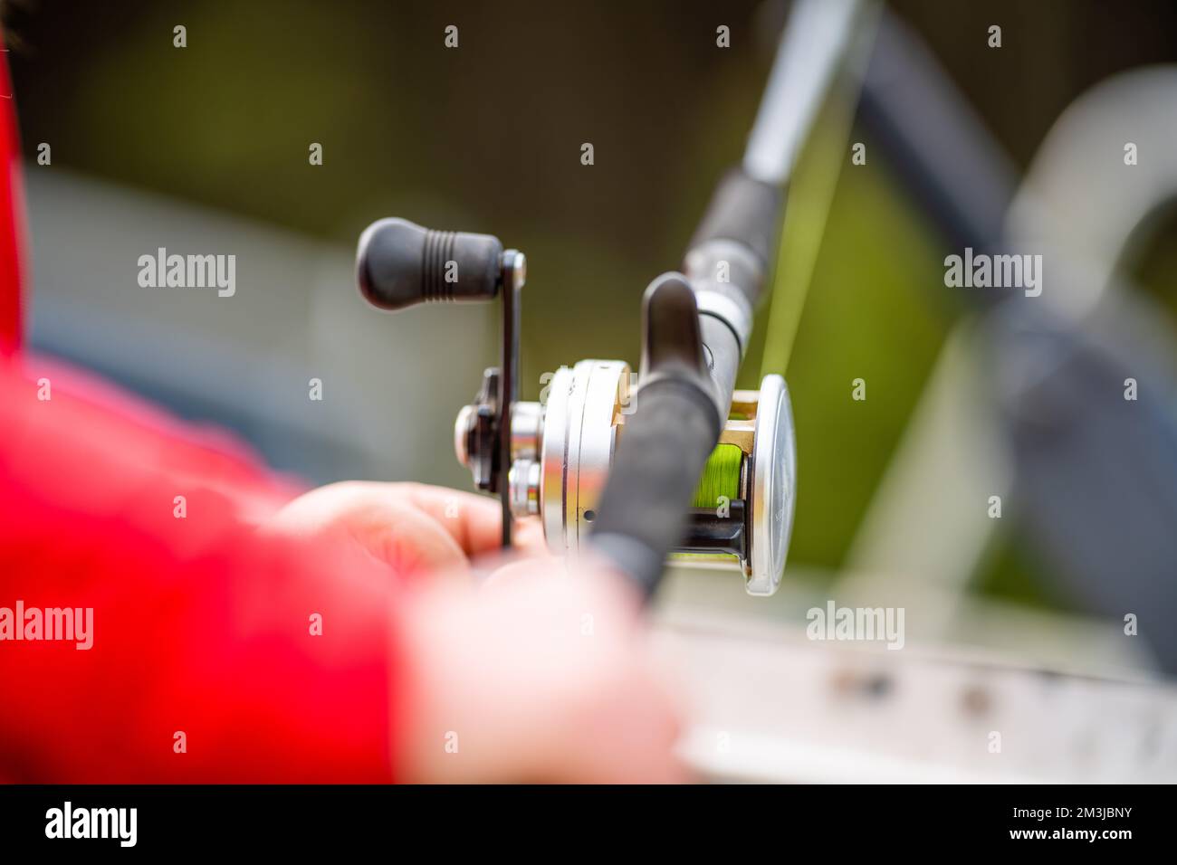 model girl fishing in a boat in summer in australia Stock Photo - Alamy